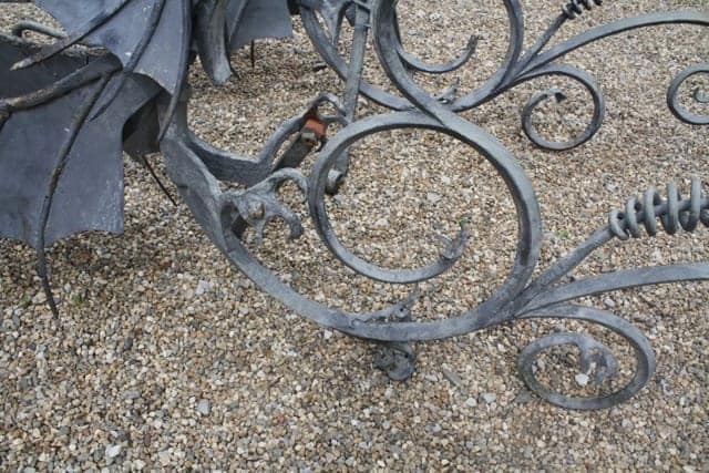Pair of Monumental Wrought Iron Wall Mounted Dragons – RT Facts